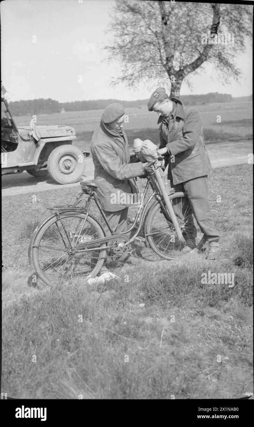 Soldiers of the British 11th Armoured Division inspect Panzerfaust anti ...