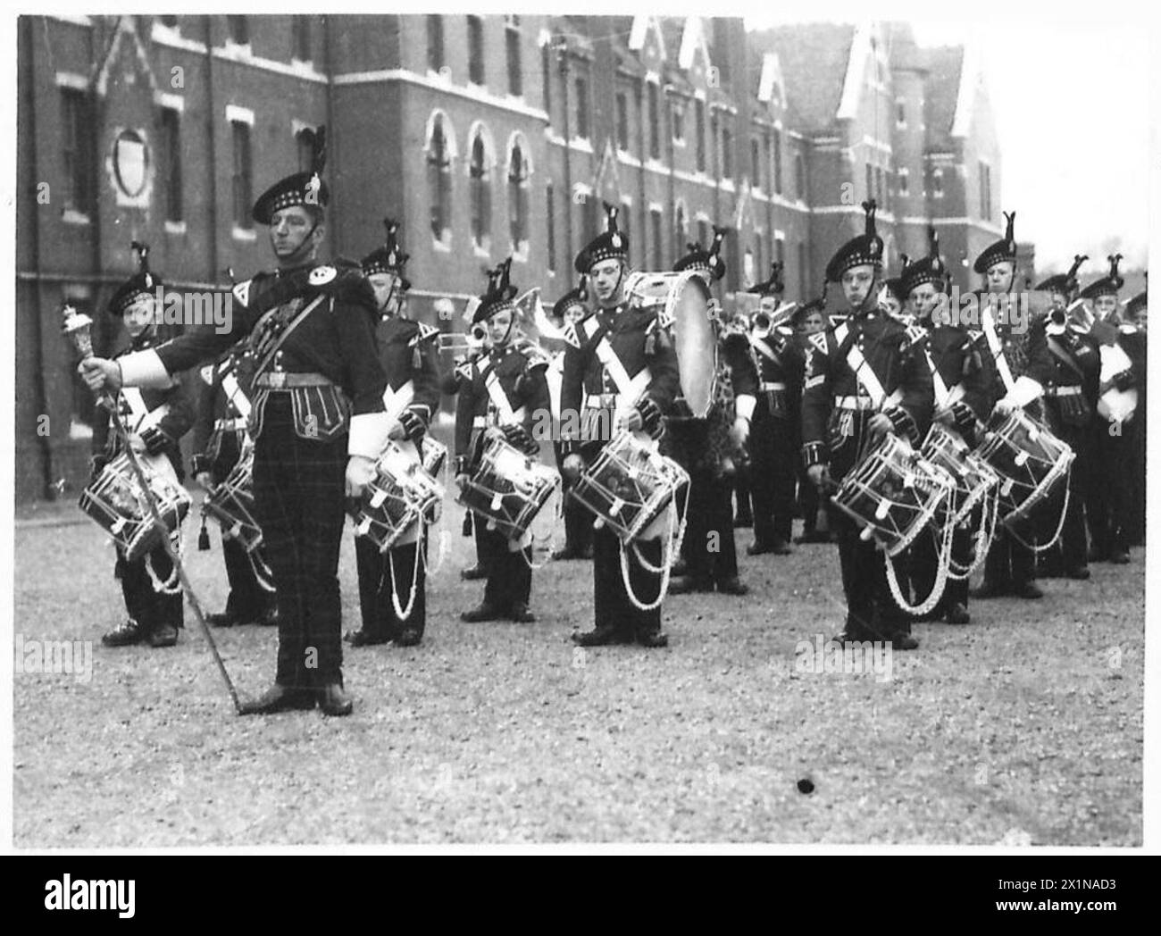 The 1st Battalion of the King’s Own Scottish Borderers performs with ...
