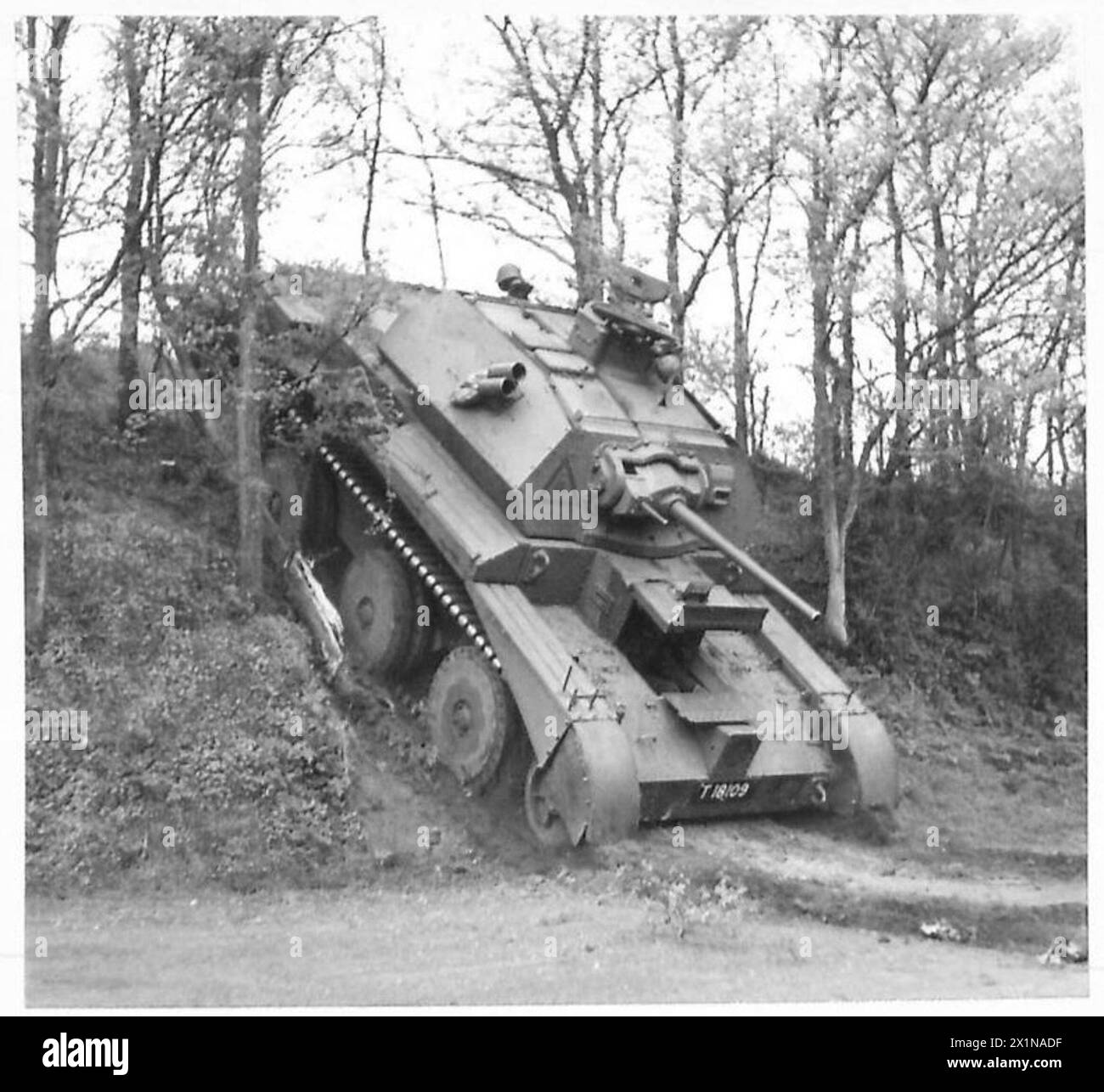 TANKS IN ACTION - Up and over. A cruiser breasting a steep ridge during ...