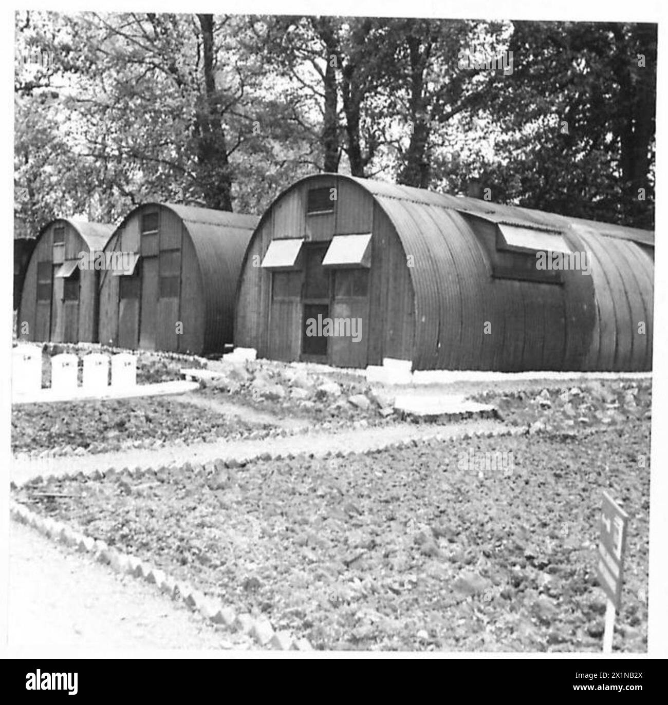 MODEL DEMONSTRATION HUTS - Swill tubs at the rear of the Cookhouse ...