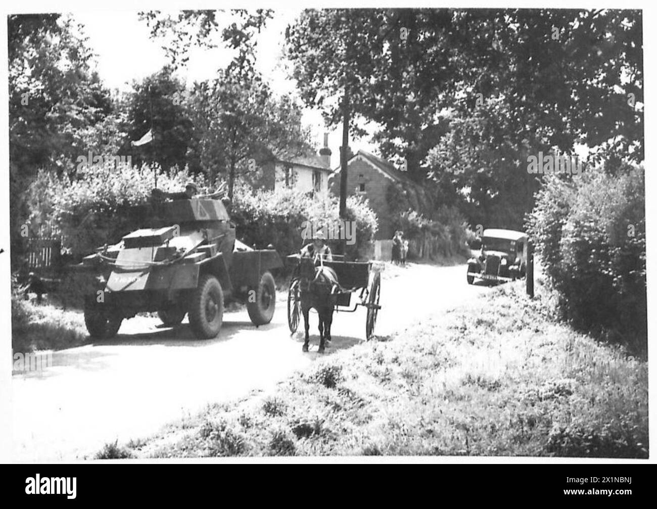 FAST SCOUT TANKS EXERCISING - Tank passing pony trap during exercise ...