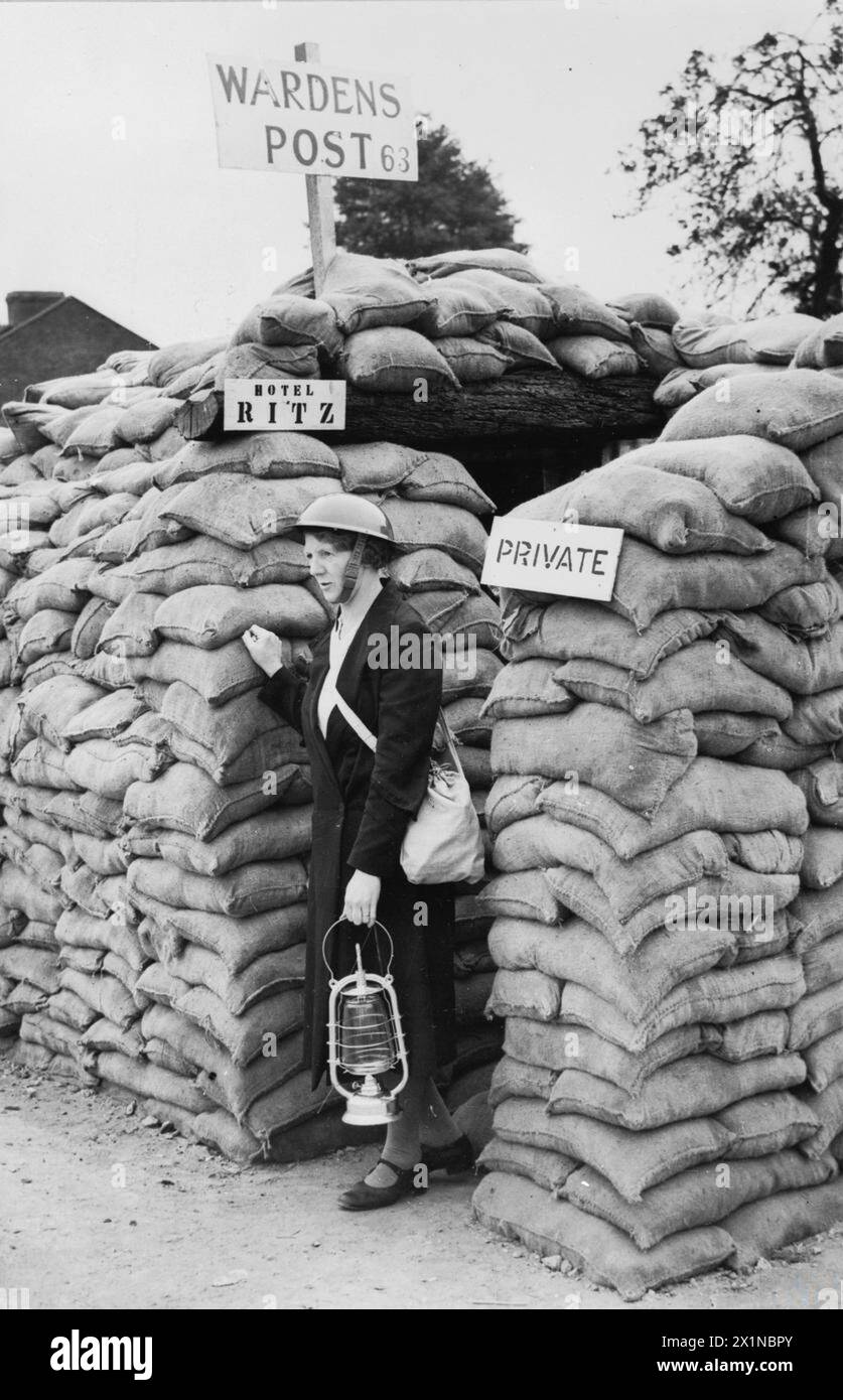 Mrs. A.M. Fordham serves as an air raid warden in Chadwell Heath, Essex ...
