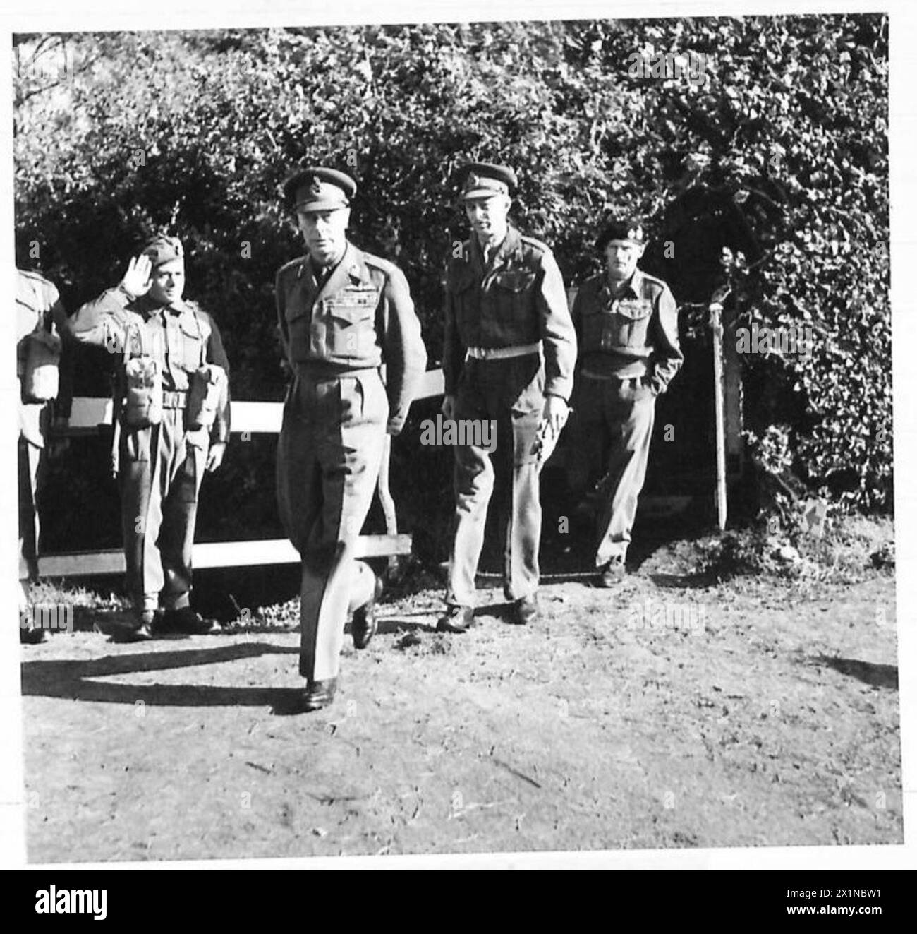 HIS MAJESTY THE KING VISITS HIS TROOPS. - H.M. the King, accompanied by ...