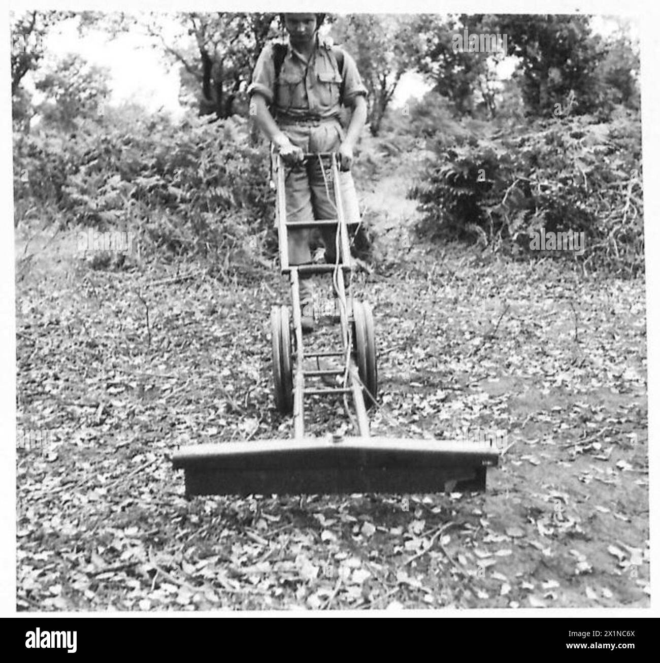 Features a British Army vehicle equipped with a search coil and paint ...