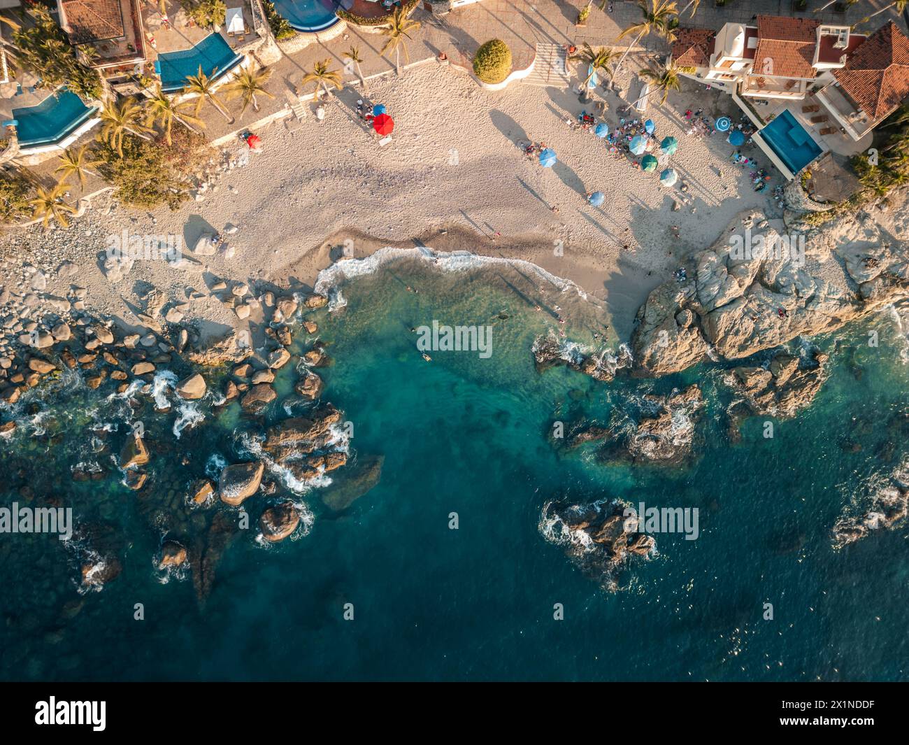 Top down aerial view of Conchas Chinas Beach in Puerto Vallarta Mexico ...