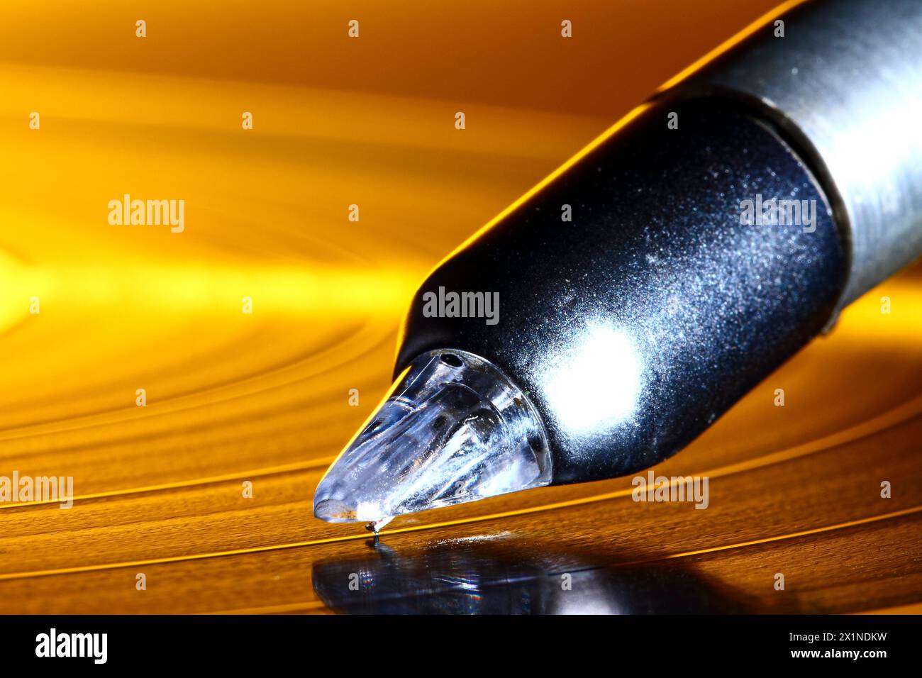 Close up of a HI-FI record player turntable stylus tracking a groove on ...