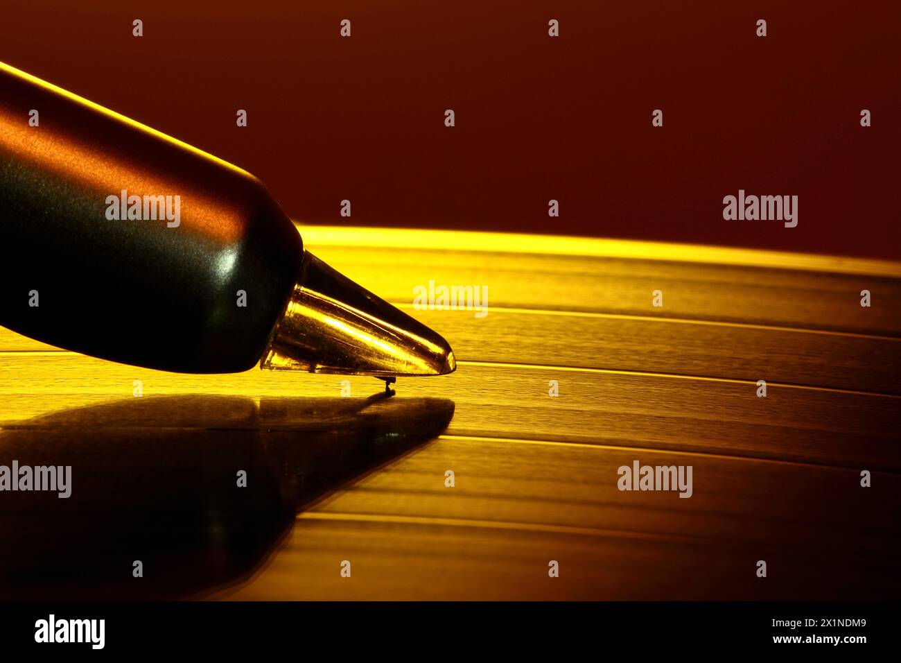 Close up of a HI-FI record player turntable stylus tracking a groove on ...