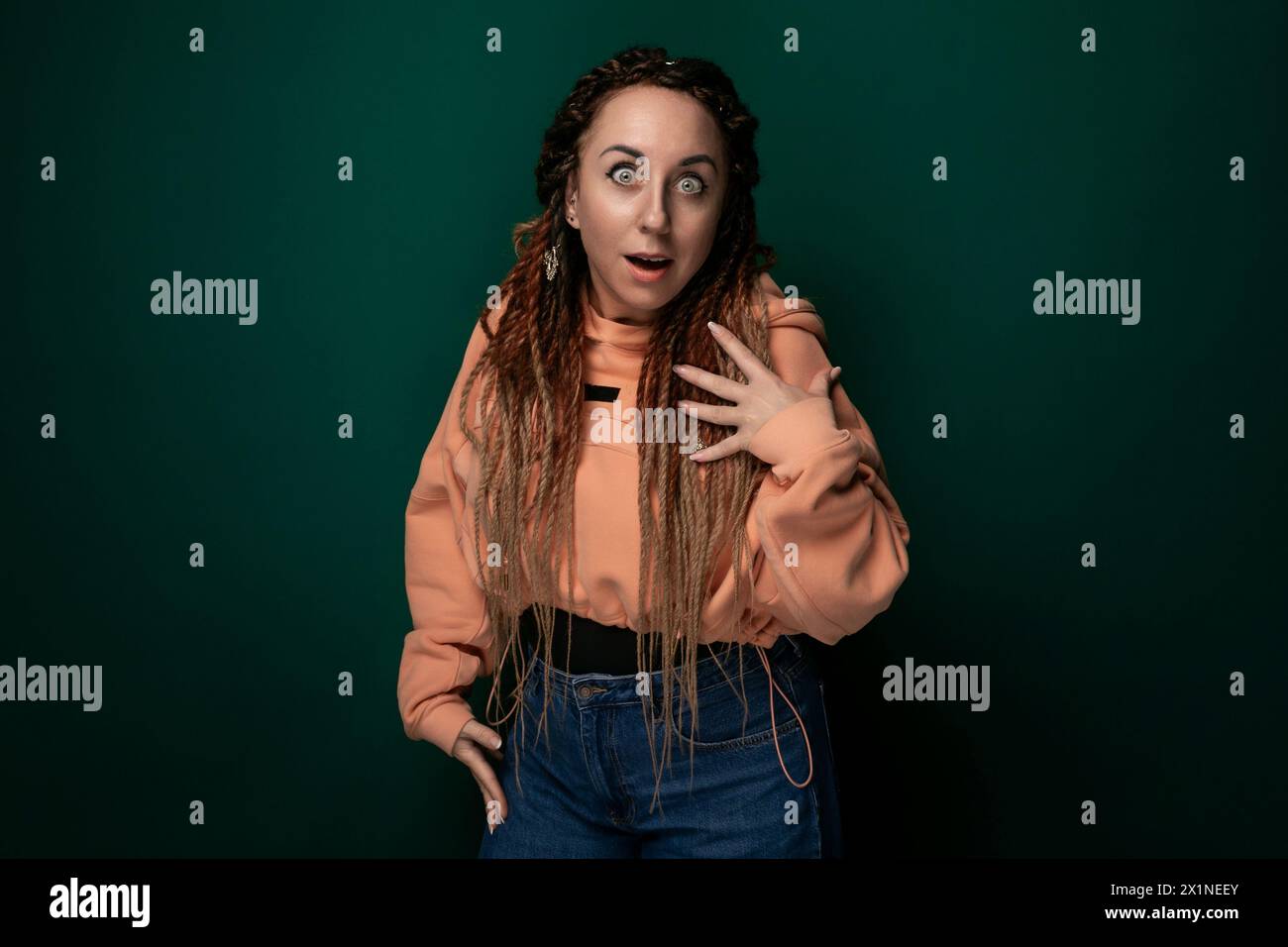Woman With Long Hair and a Surprised Expression Stock Photo - Alamy