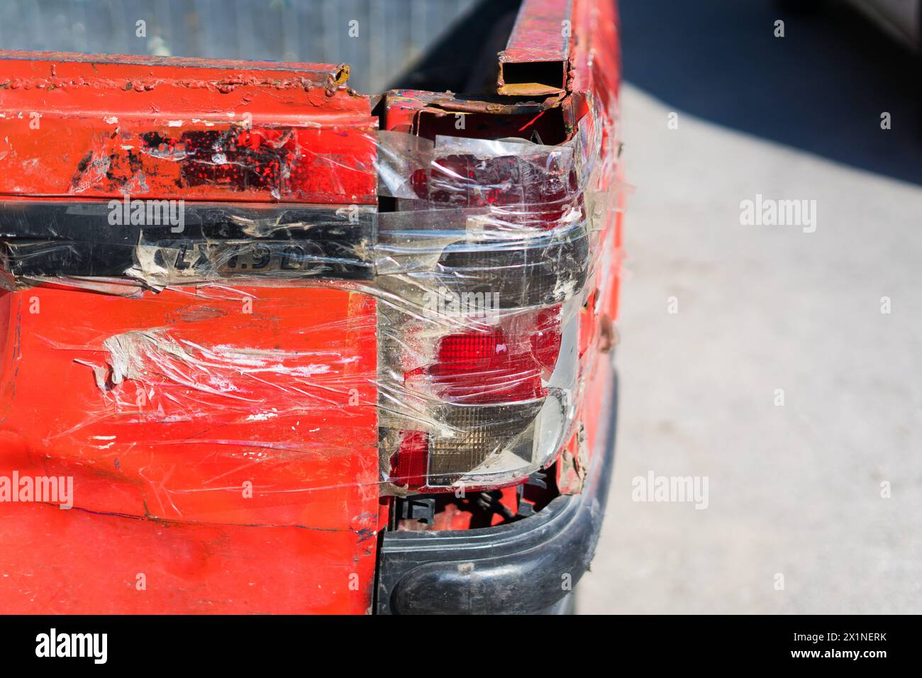 Headlight of an old abandoned car. Old broken headlight. Car body ...