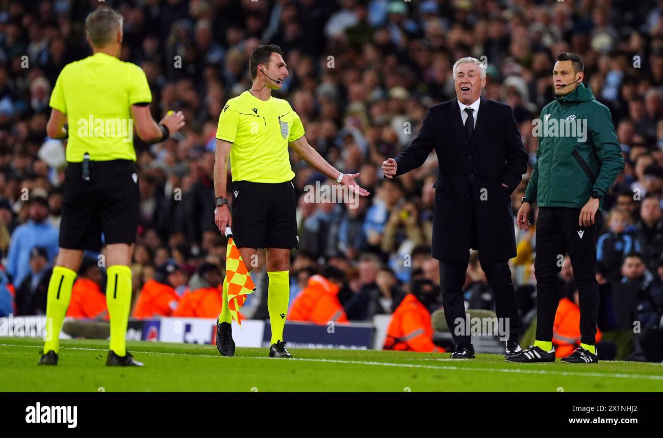 Real Madrid head coach Carlo Ancelotti peaking with referee Daniele ...