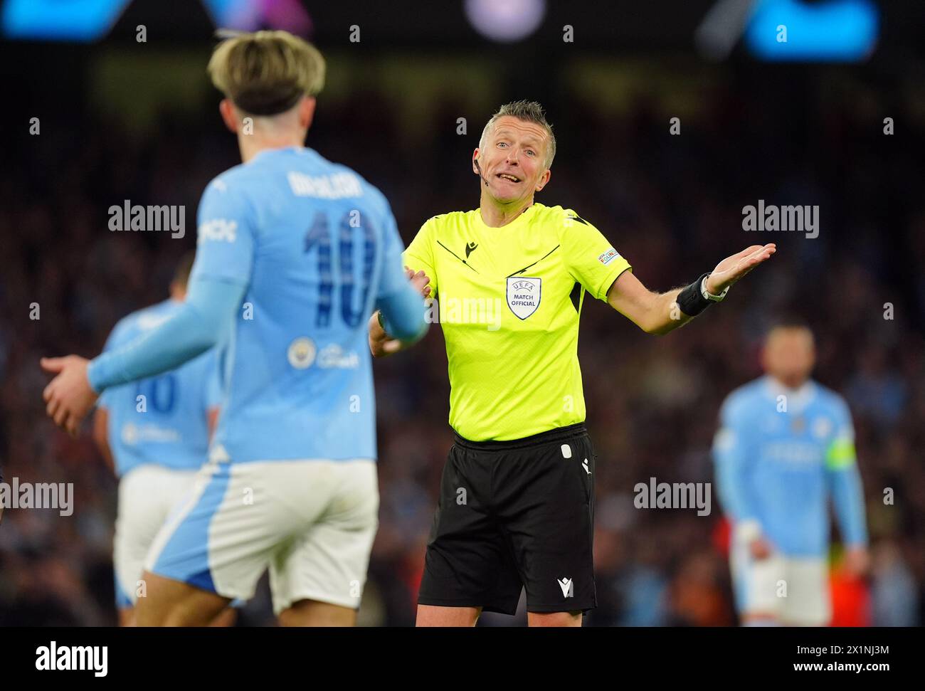 Referee Daniele Orsato with Manchester City's Jack Grealish during the ...