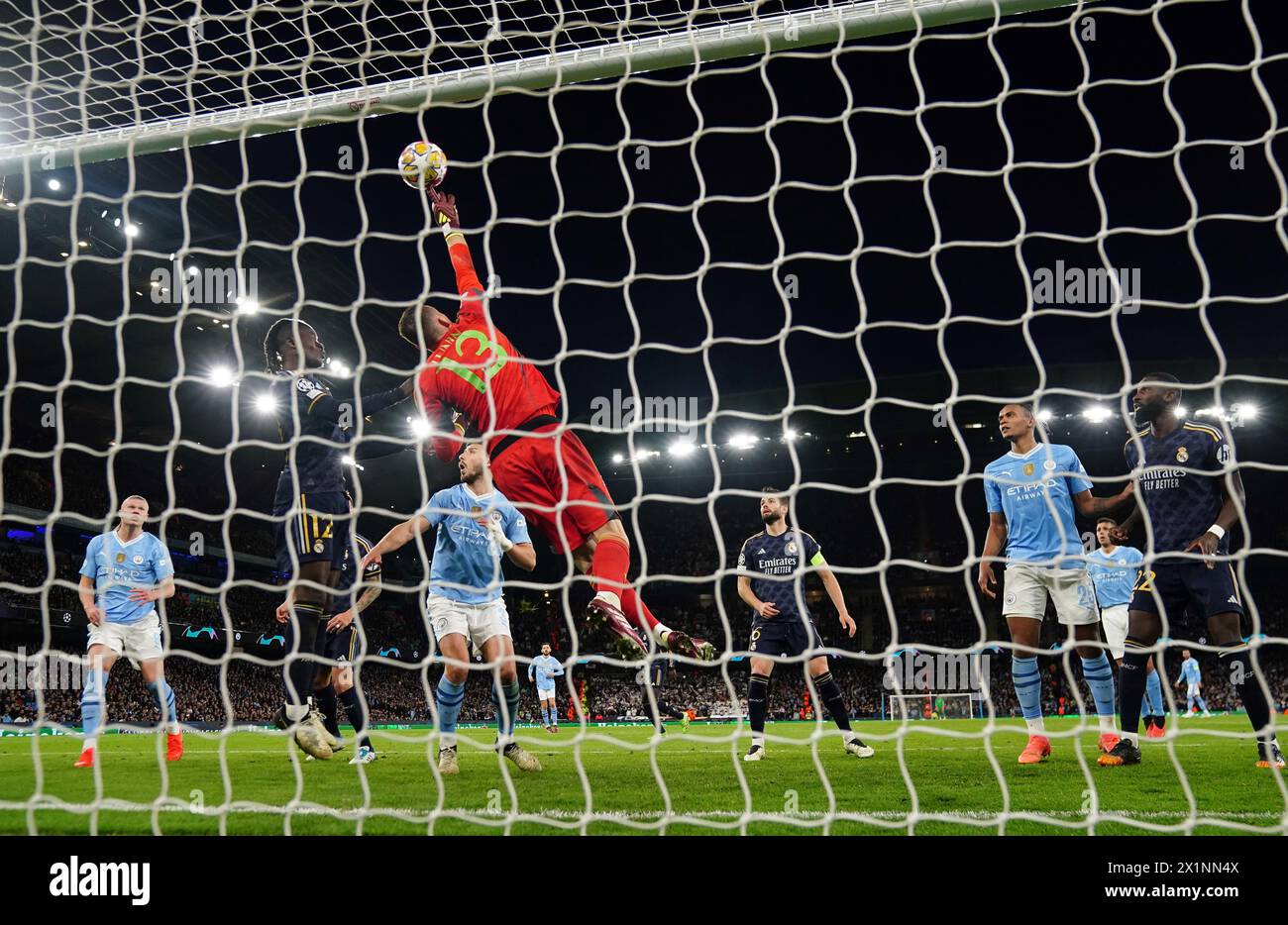 Real Madrid's Andriy Lunin gets his finger tips to the ball during the ...