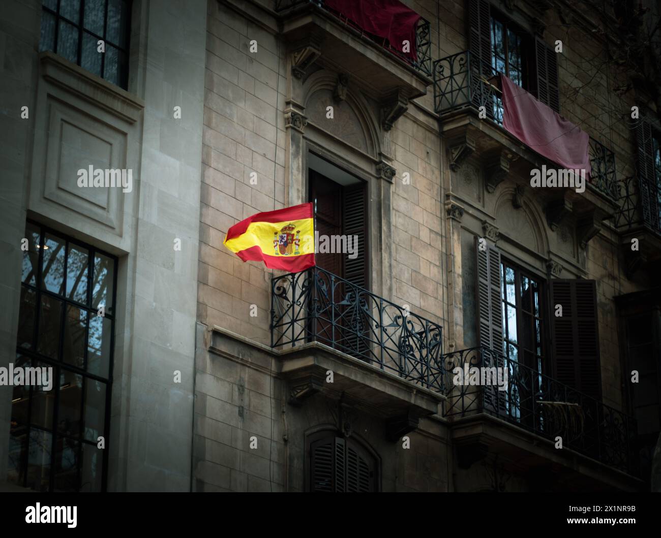 The Spanish flag proudly waves atop an ancient Spanish architectural ...