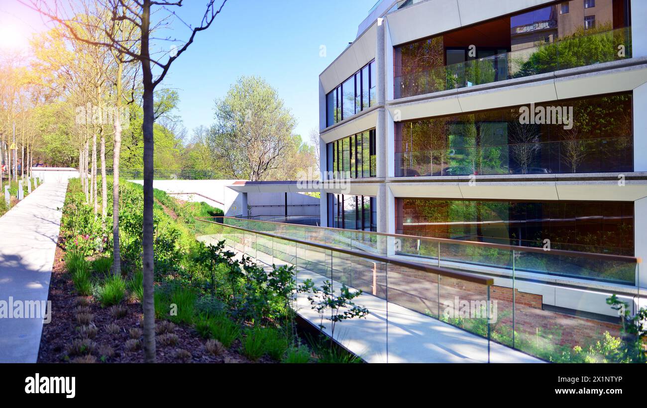 Eco architecture. Green tree and new residential building. Harmony of ...