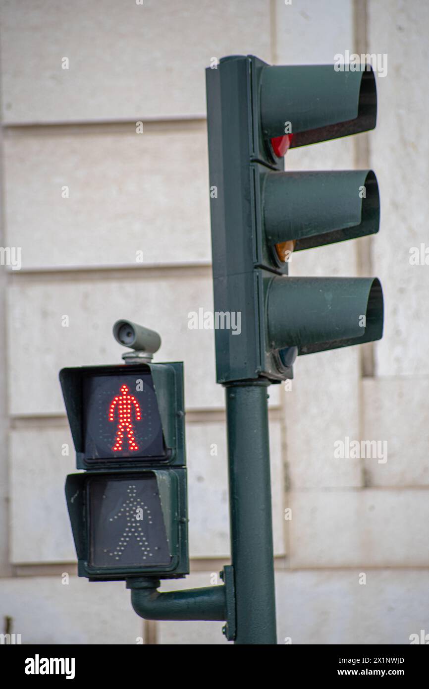 Red pedestrian crossing traffic light with blurred background of ...
