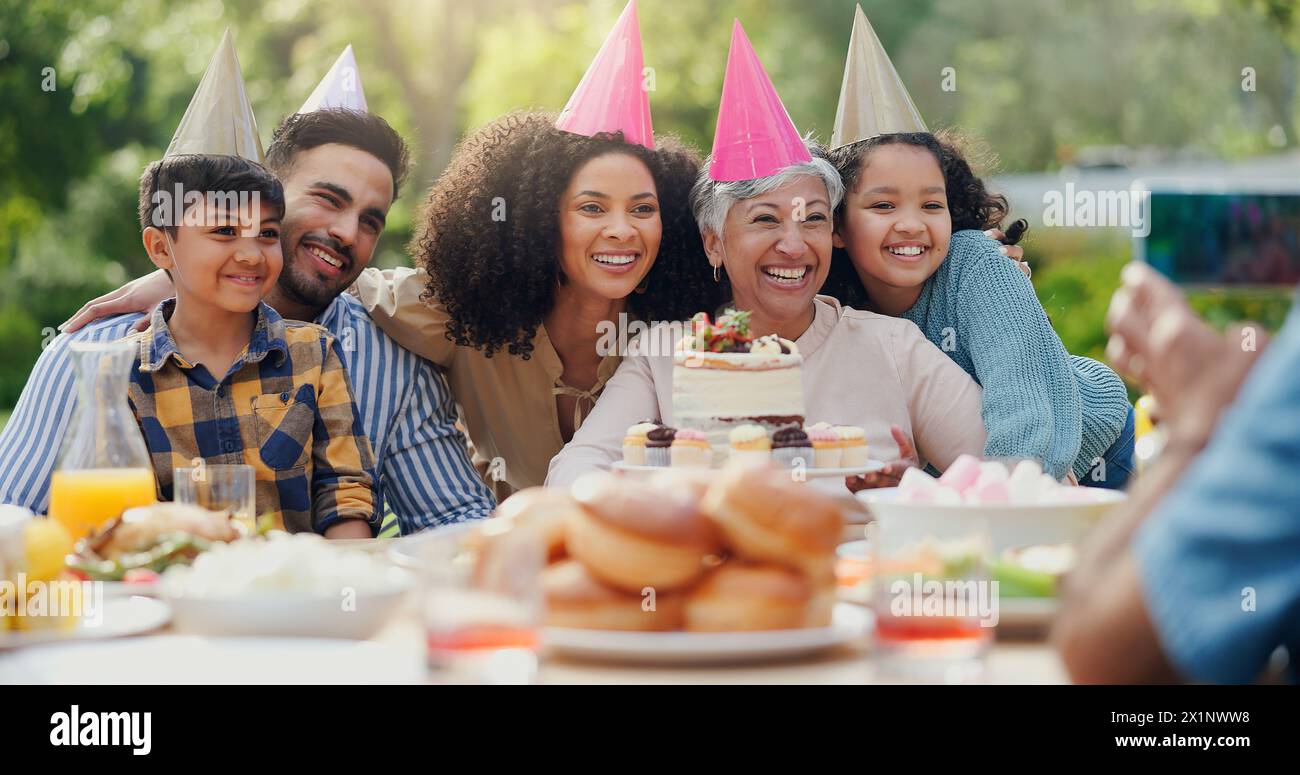 Family, birthday party and people taking photograph outdoor, happiness ...
