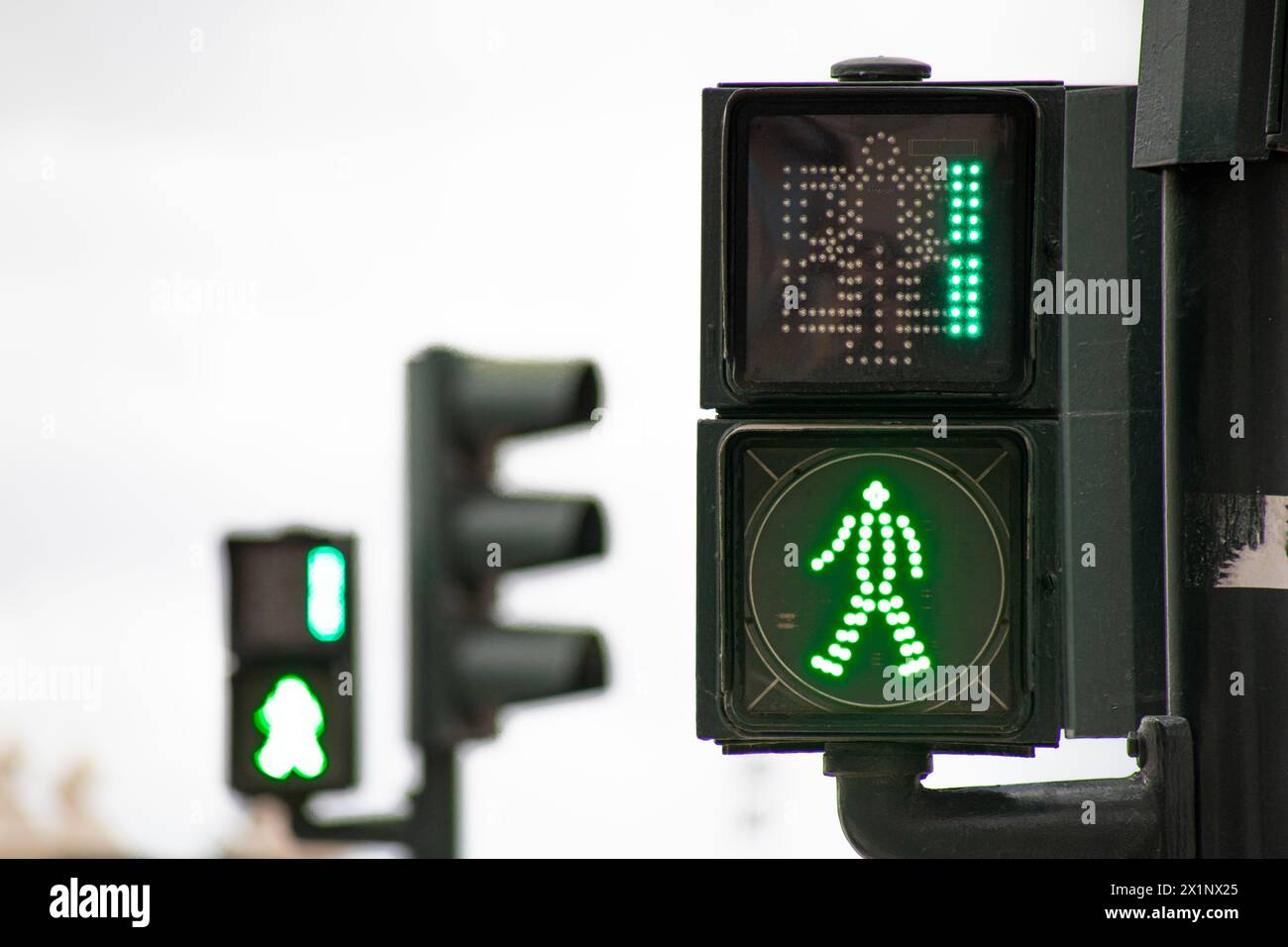 Green traffic light for pedestrians counting down in 1 seconds in ...