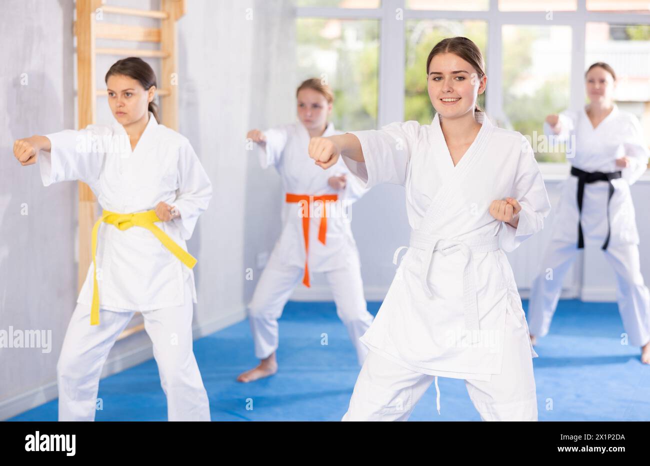 Teenage girls in kimono doing kata training Stock Photo - Alamy