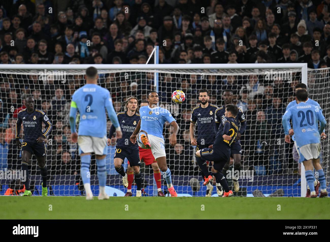 Manuel Akanji of Manchester City battles for possession with Brahim ...