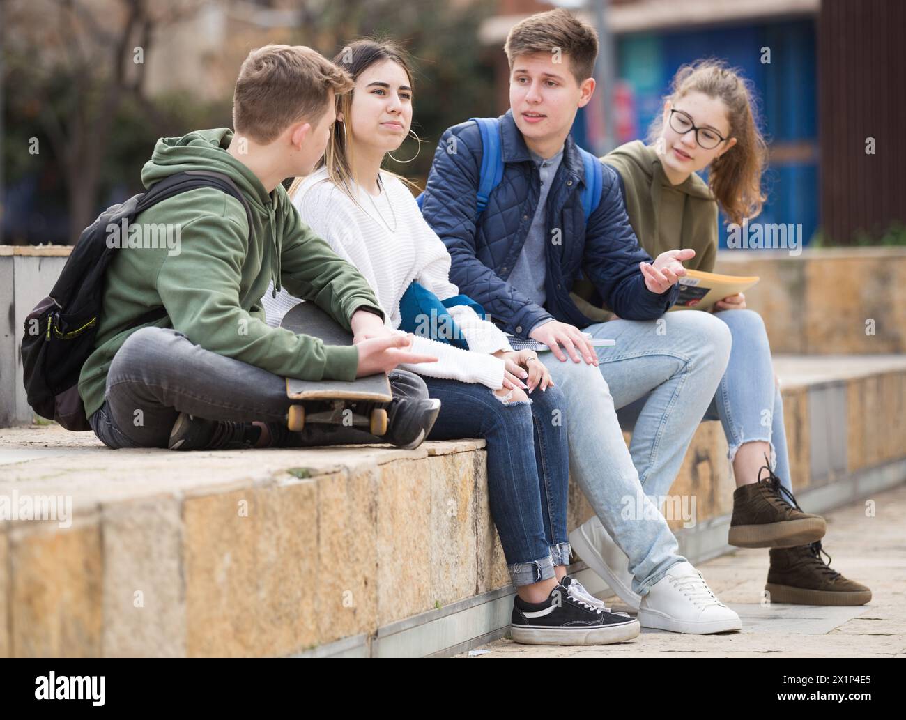Group of positive teenagers having fun together Stock Photo - Alamy