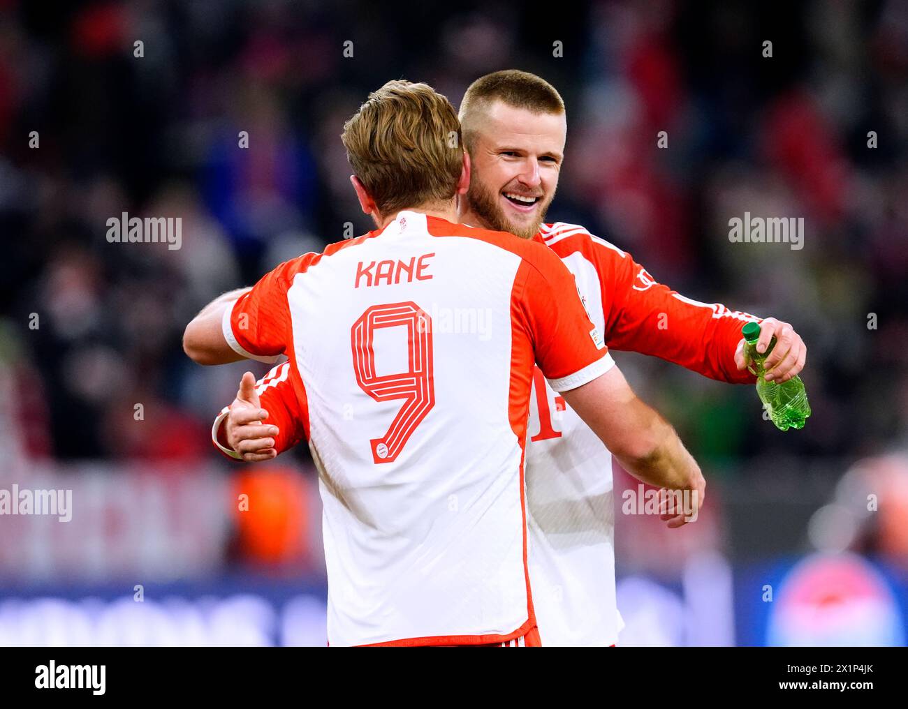 Bayern Munich's Harry Kane celebrates with team-mate Eric Dier at the ...