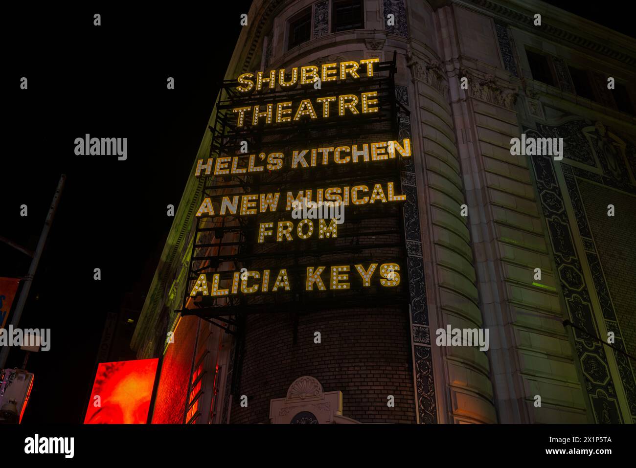 Close-up view of the Shubert Theater facade with illuminated signage ...