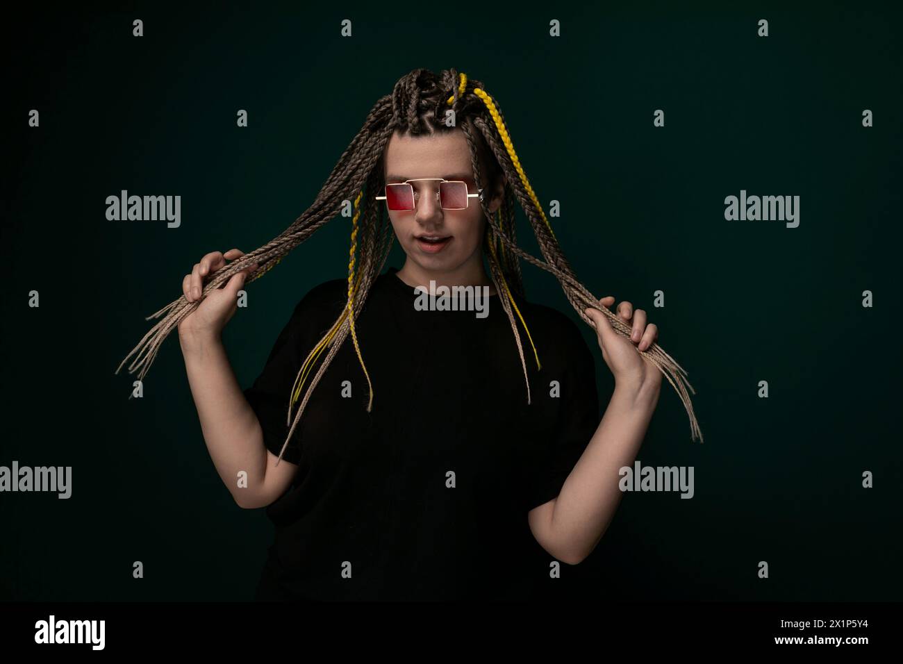 A Man With Long Dreadlocks and Red Glasses Stock Photo - Alamy