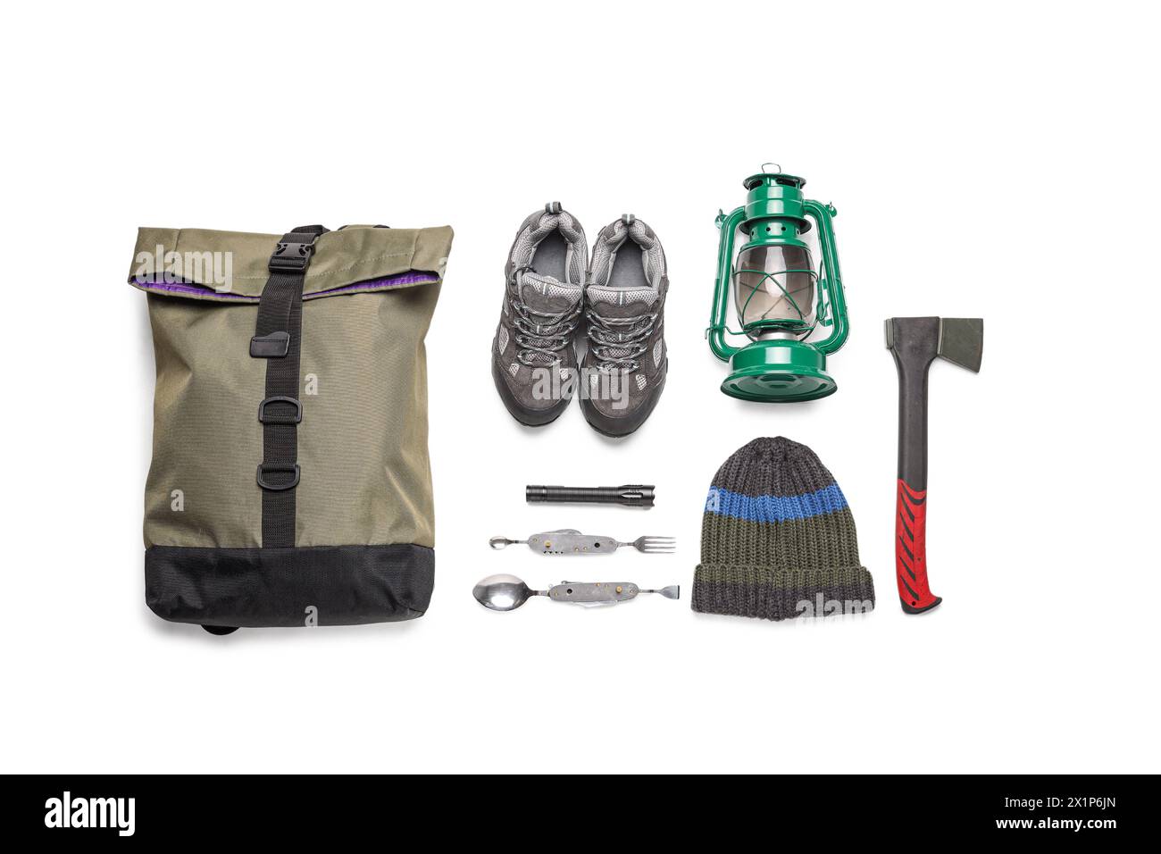 Set of hiking essentials with backpack, oil lantern and outdoor gear on ...
