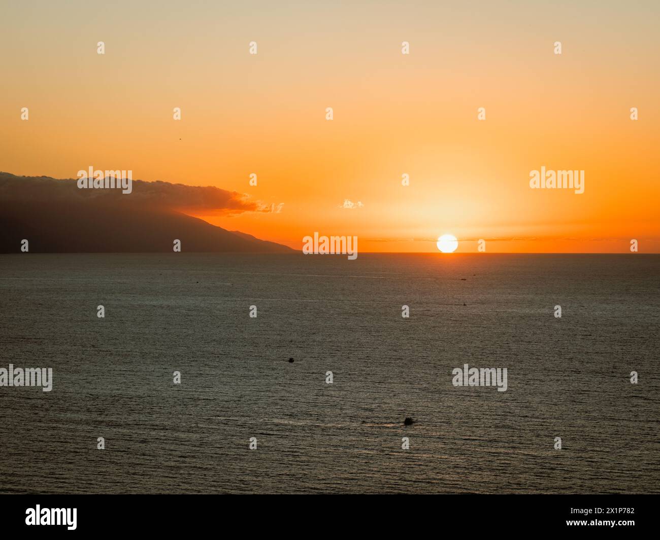 Sun setting over Banderas Bay seen from mirador at Hill of the Cross ...
