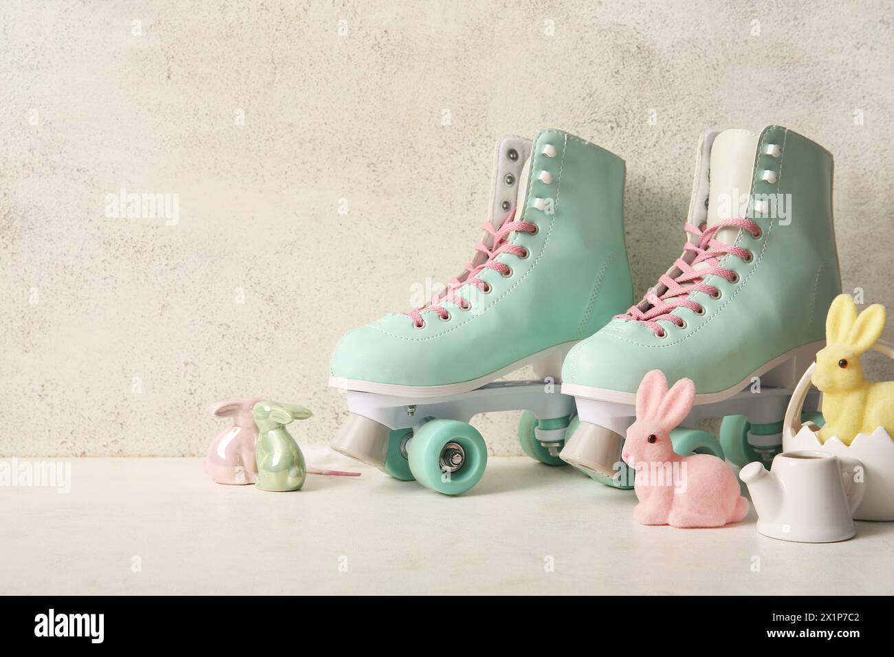 Vintage roller skates and toys bunny on white background. Easter ...