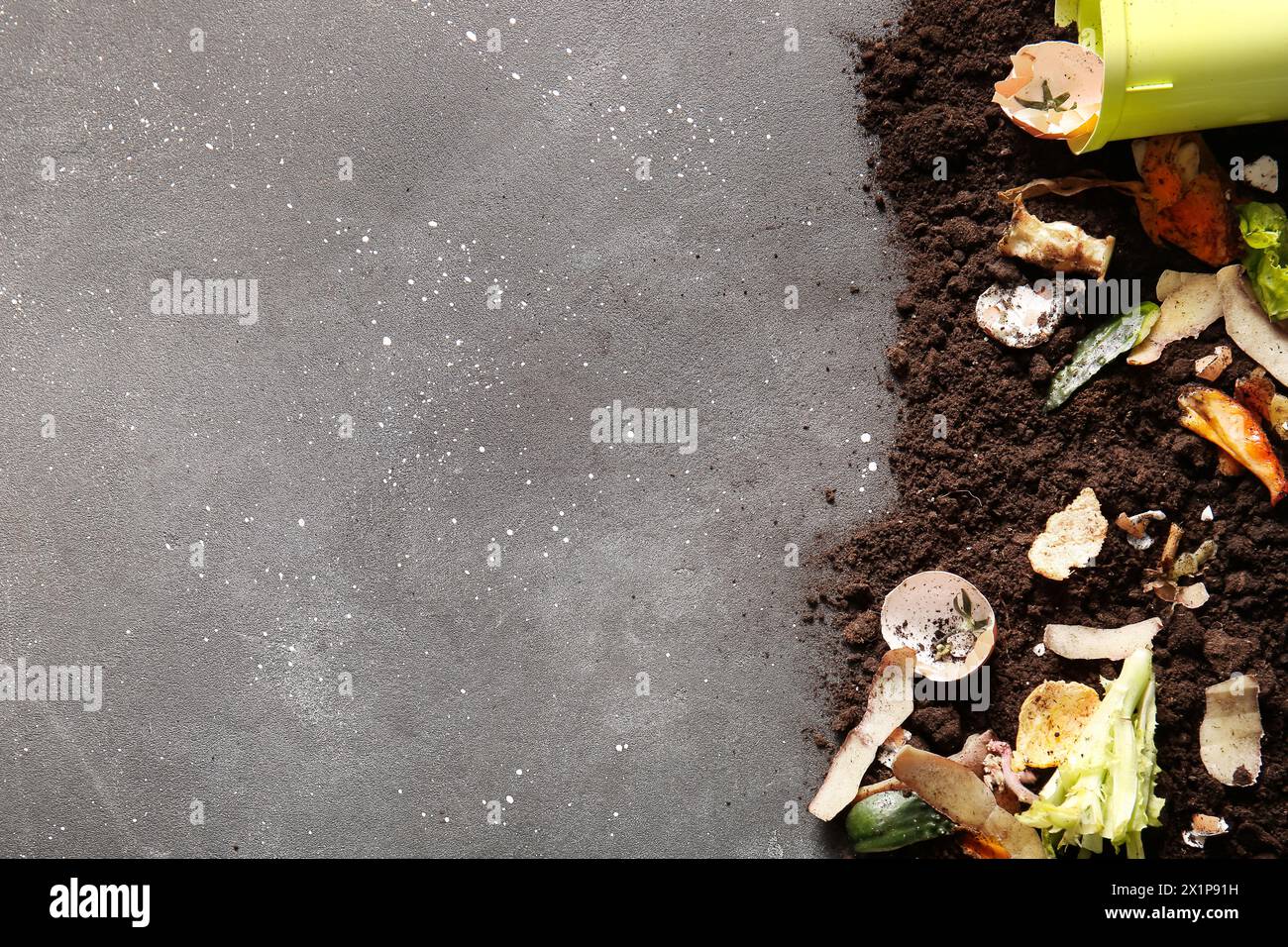 Organic waste and soil on grey grunge background. Compost recycling ...