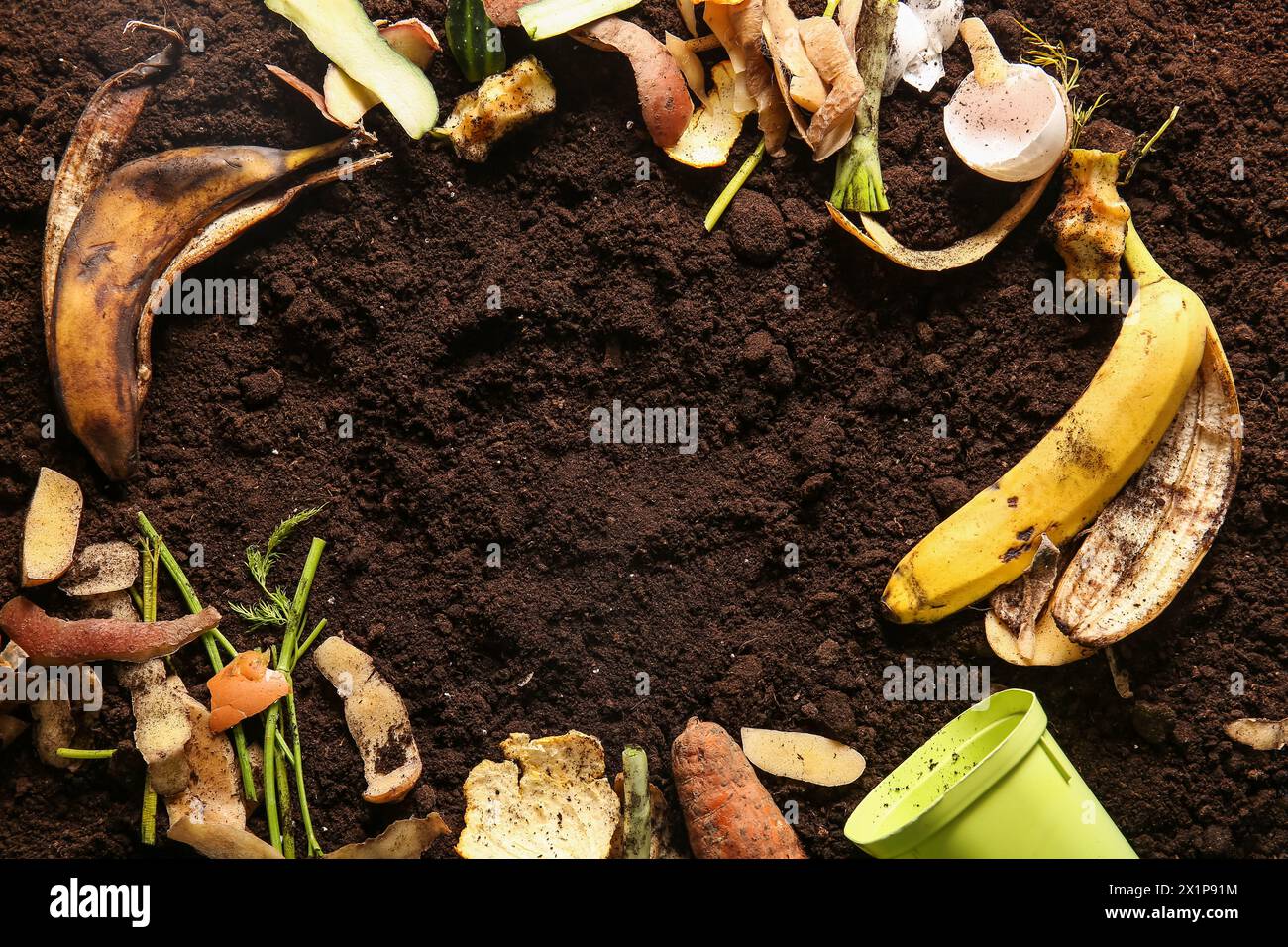 Frame made from organic waste on soil. Compost recycling concept Stock ...