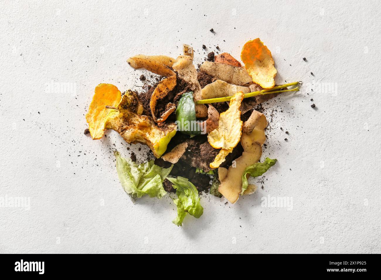 Organic waste and soil on white grunge background. Compost recycling ...