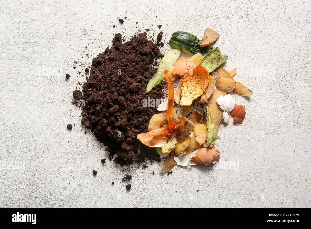 Organic waste and soil on white grunge background. Compost recycling ...