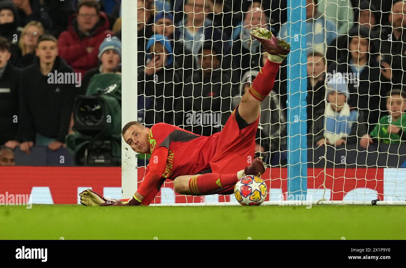 Real Madrid's Andriy Lunin saves from Manchester City's Mateo Kovacic ...