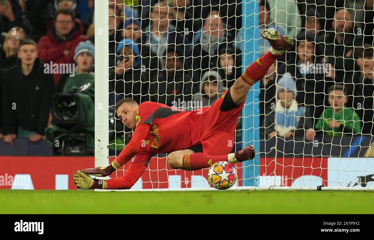 Real Madrid's Andriy Lunin saves from Manchester City's Mateo Kovacic ...