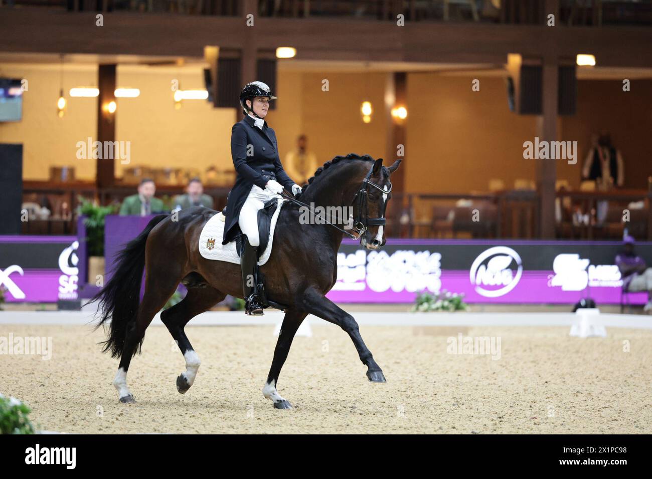 Alisa Glinka of Moldova with Abercrombie during the Dressage Grand Prix ...