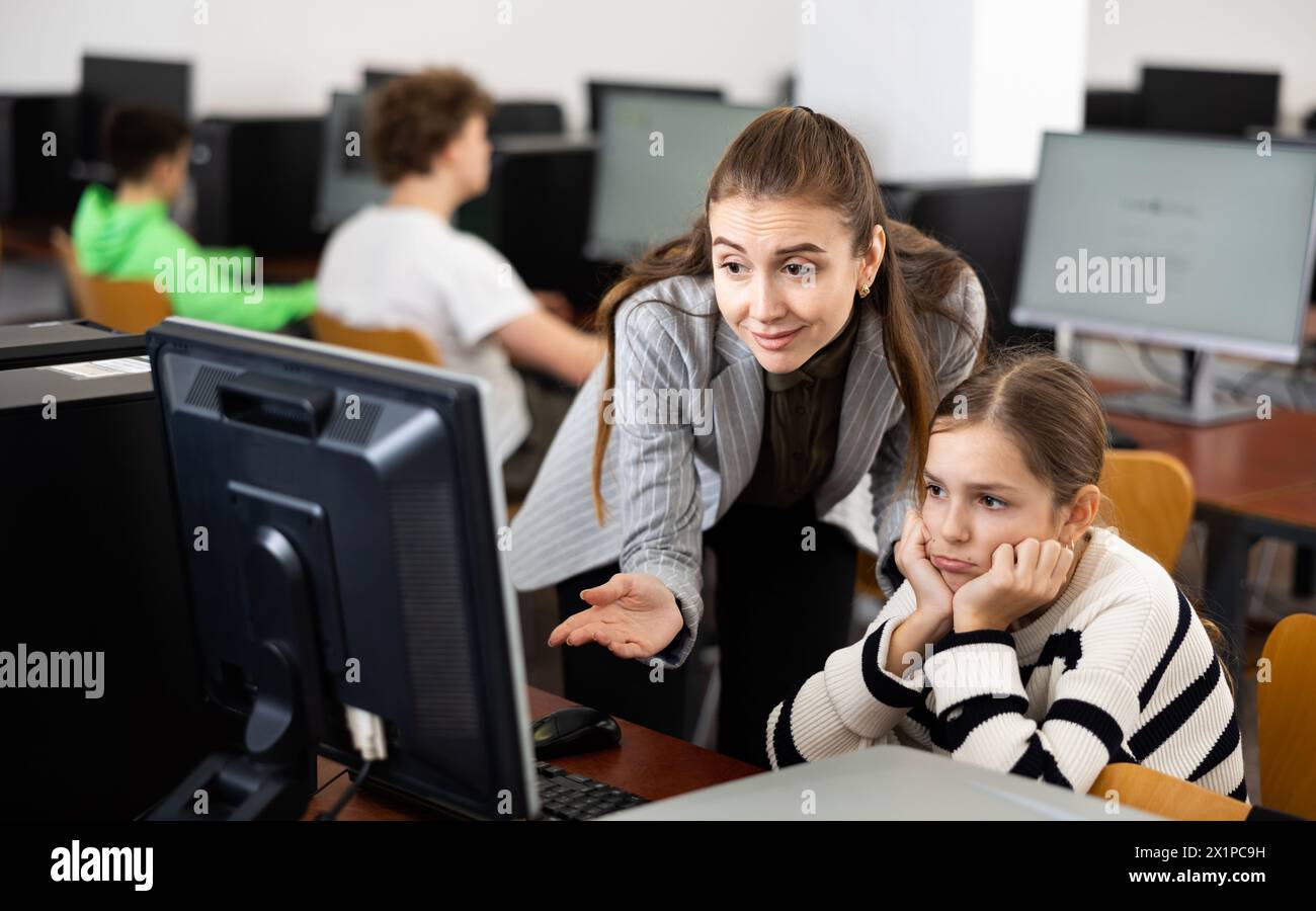 Teacher student comforting hi-res stock photography and images - Alamy