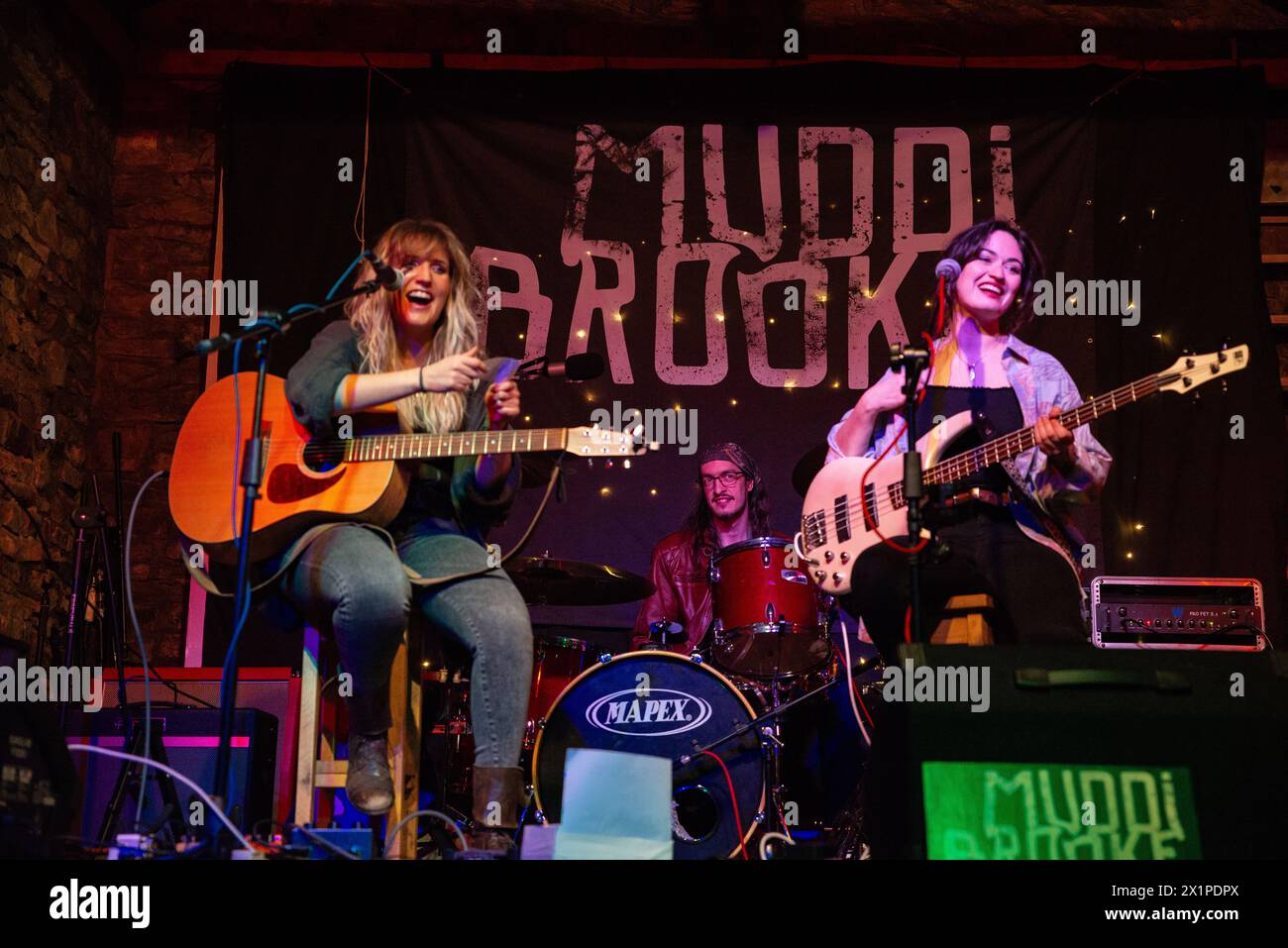 Glossop 14th April 2024, Brooke, Morgan Pettigrew and Anna Melidone of MuddiBrooke performing at ...