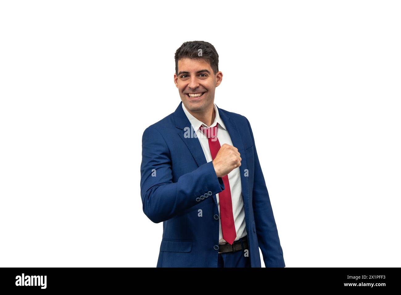 triumph of a smiling businessman as he clenches his fist with a ...