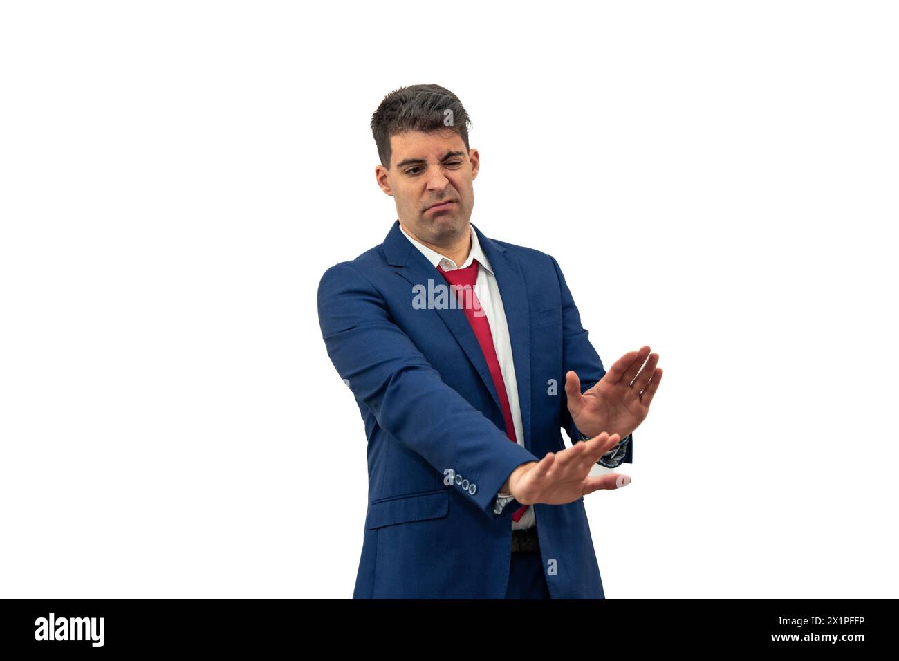 businessman he extends his hands forward and downward in a rejection ...