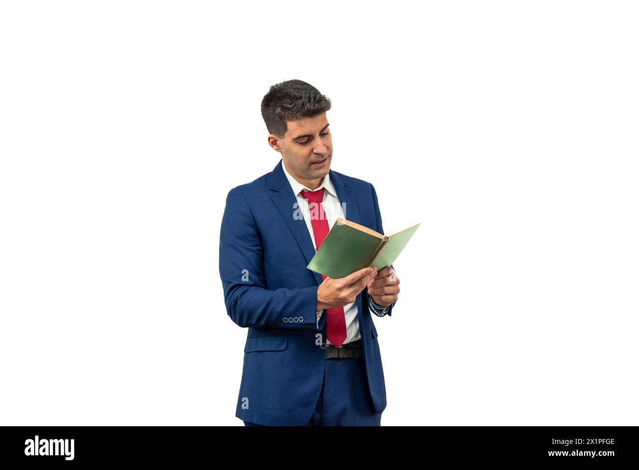 businessman in a blue suit and tie engrossed in reading a book with a ...