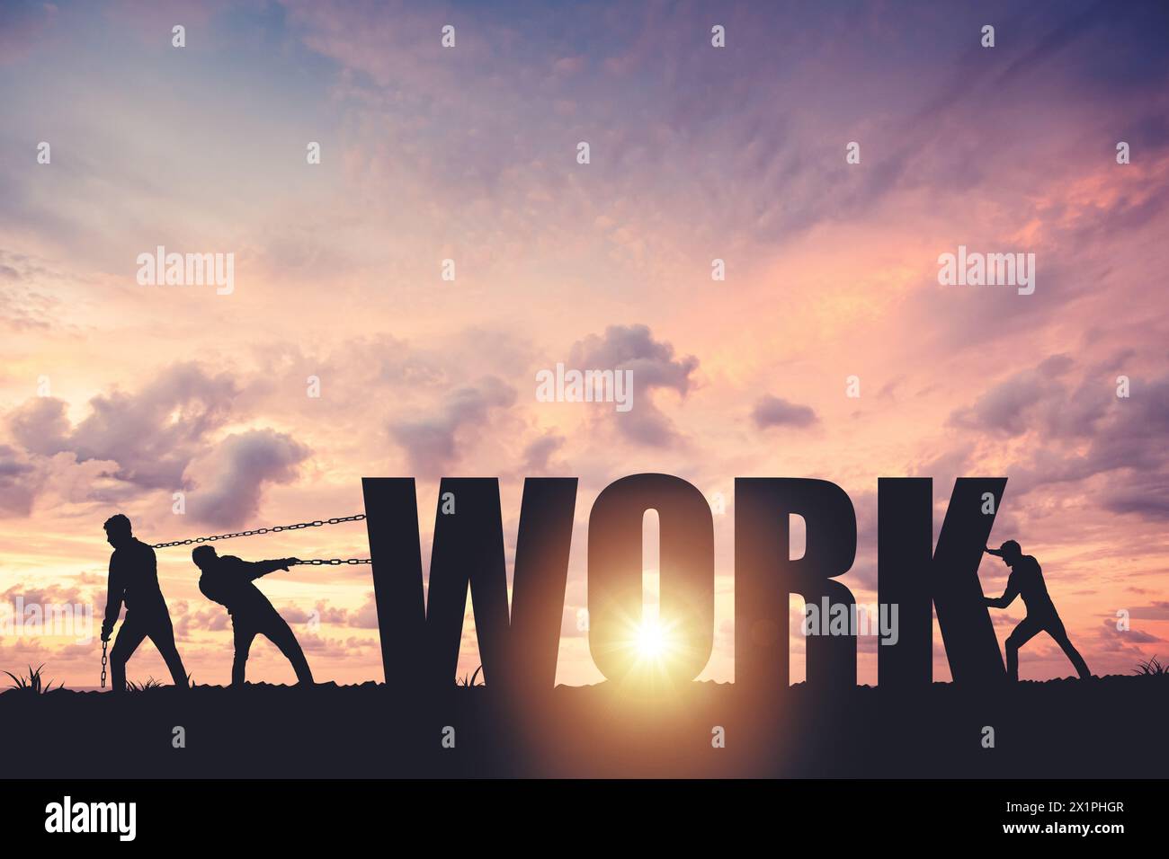 Silhouettes of people drawing the word WORK on a sunset background ...