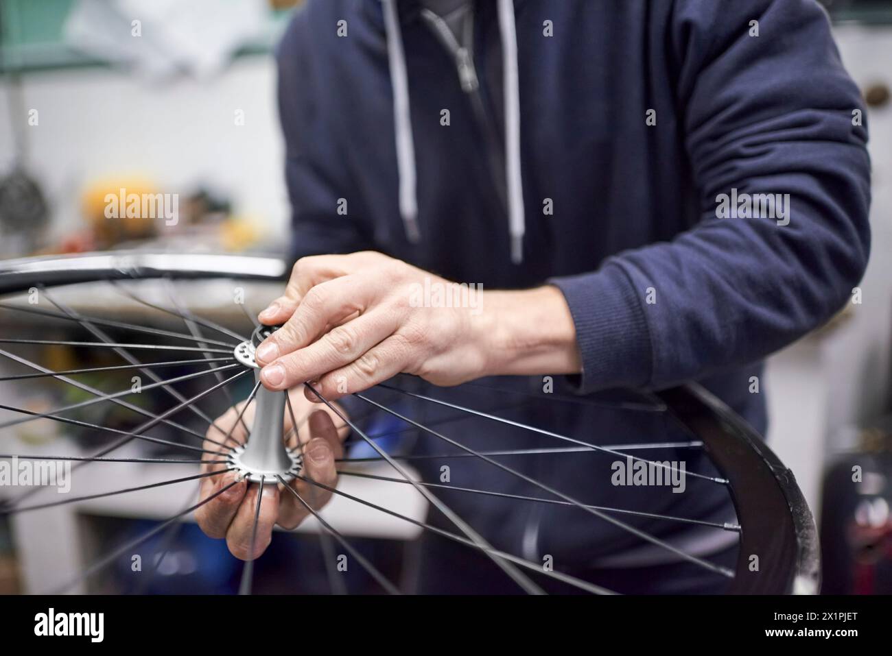 Mechanic greasing hub hi-res stock photography and images - Alamy