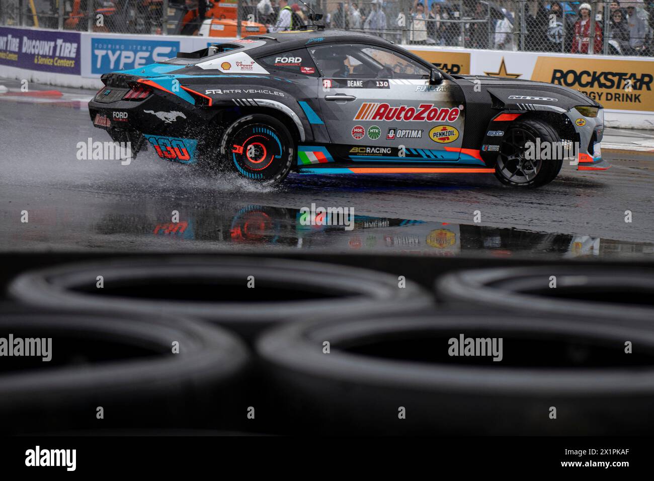 James Deane slides through the rain fighting to make it to the top 8 of ...