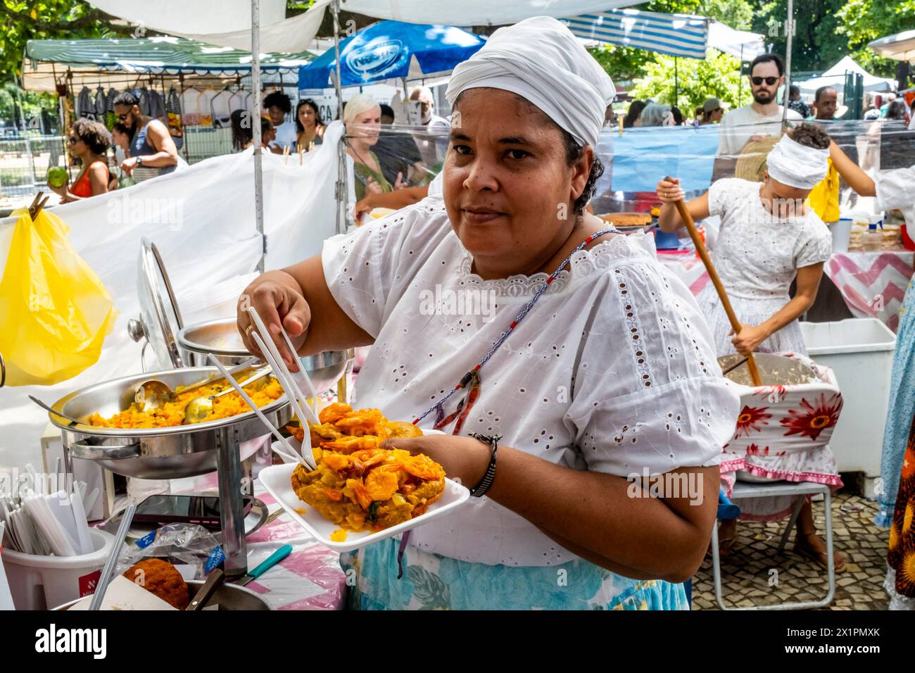 Brasilian Women In Traditional Costume Serve Food At A Cafe At The ...