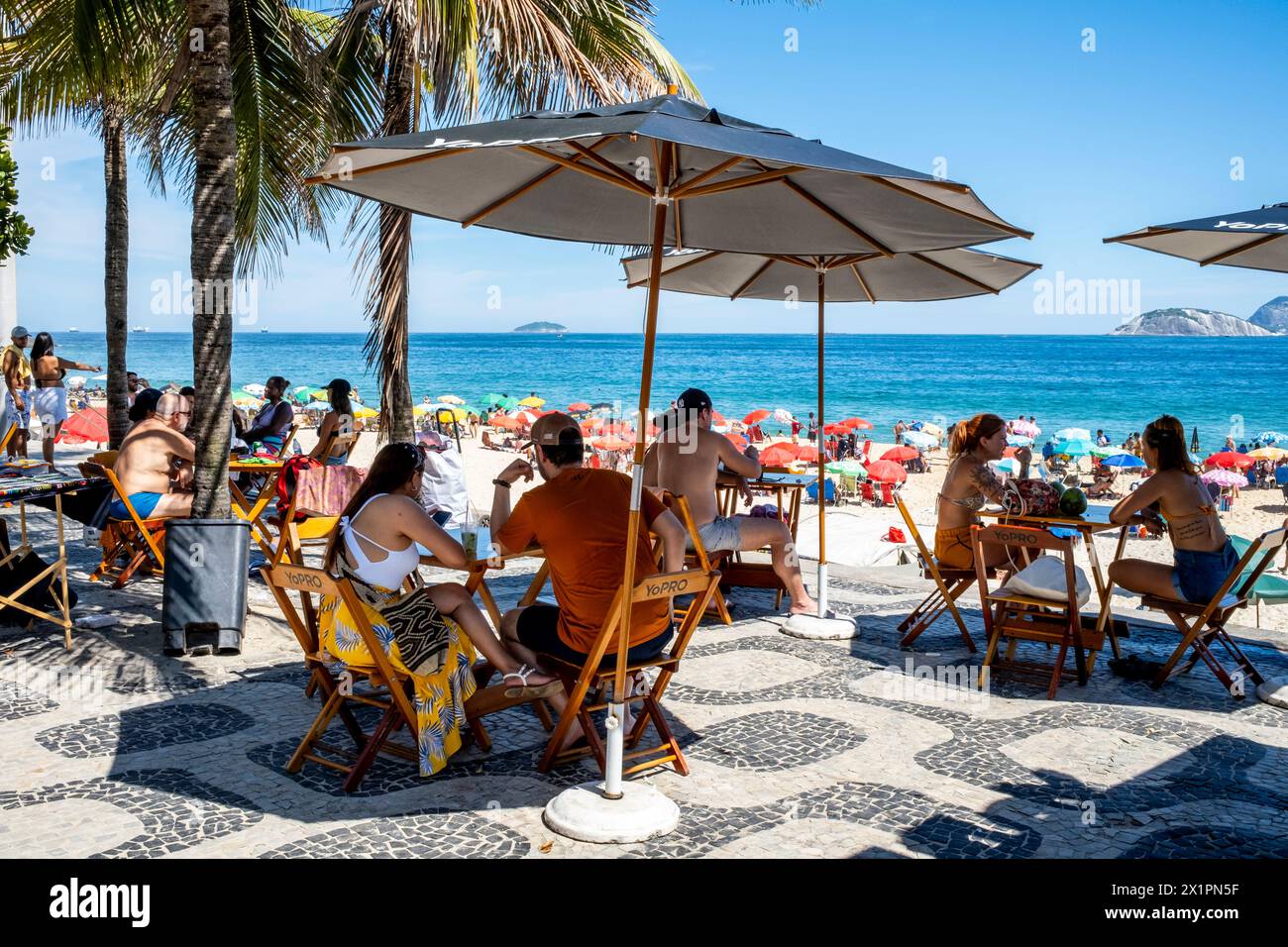 Visitors Sitting Down At An Outdoor Cafe/Bar On Ipanema Beach, Ipanema, Rio de Janeiro, Brasil ...