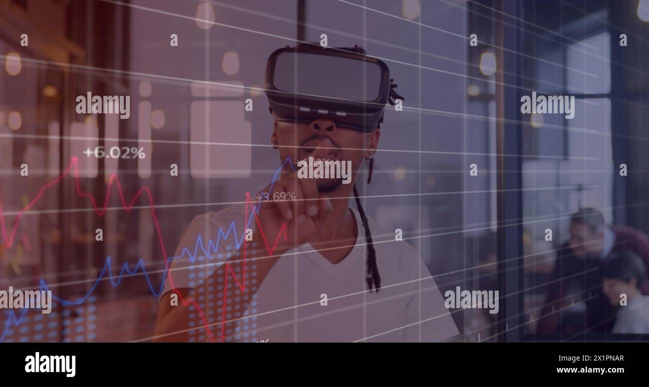 African American male wearing virtual reality headset, pointing at ...
