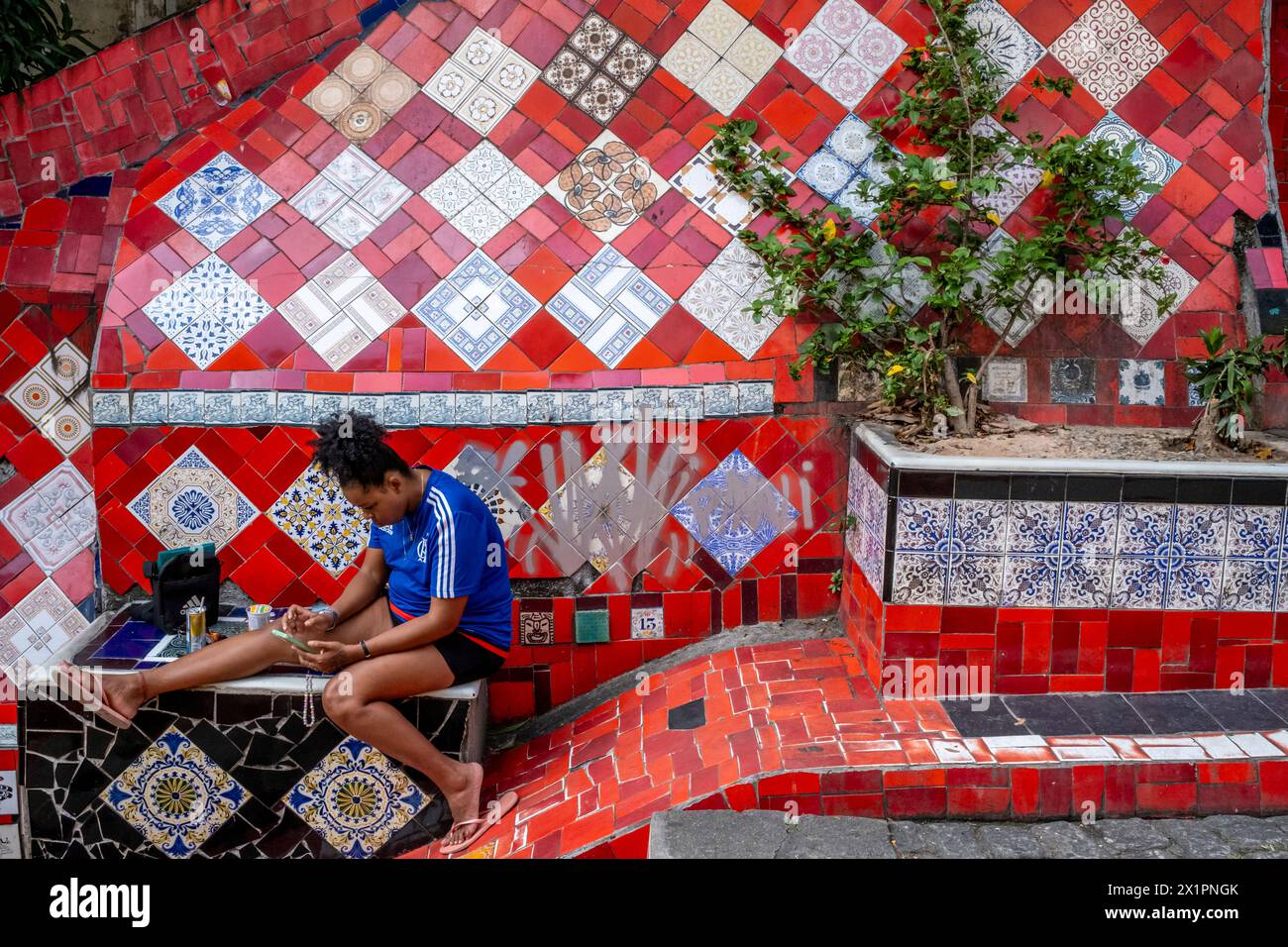 A Young Woman Sitting On The Lapa Steps (Escadaria Selaron) Rio de ...