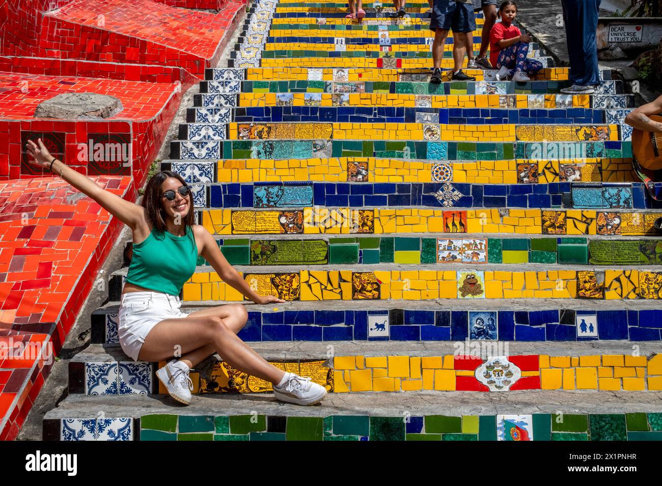 A Female Tourist Poses For A Photo On The Lapa Steps (Escadaria Selaron ...